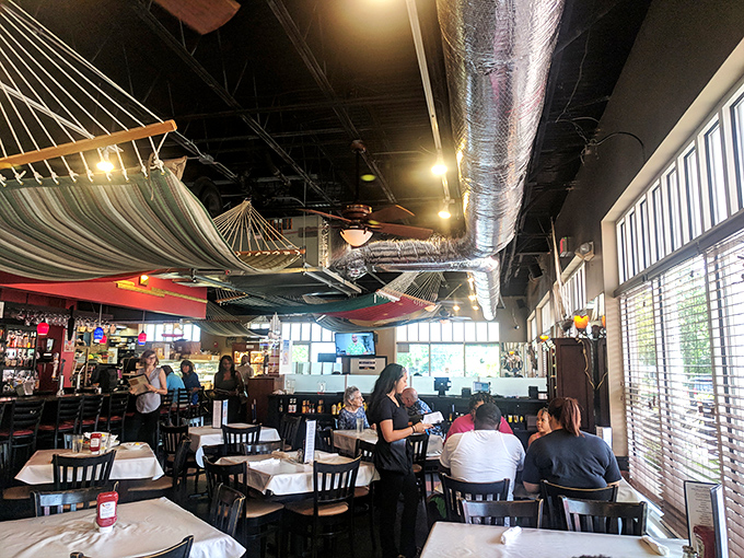 A busy dining room where hammocks overhead remind you there's always time to relax between bites of New England-inspired goodness. 