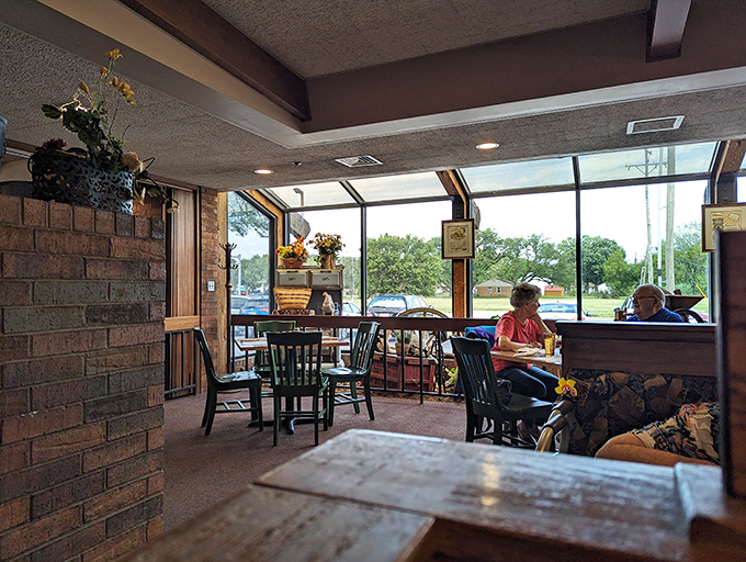 The sunlit corner offers prime people-watching real estate while you contemplate which pie flavor deserves your undivided attention.