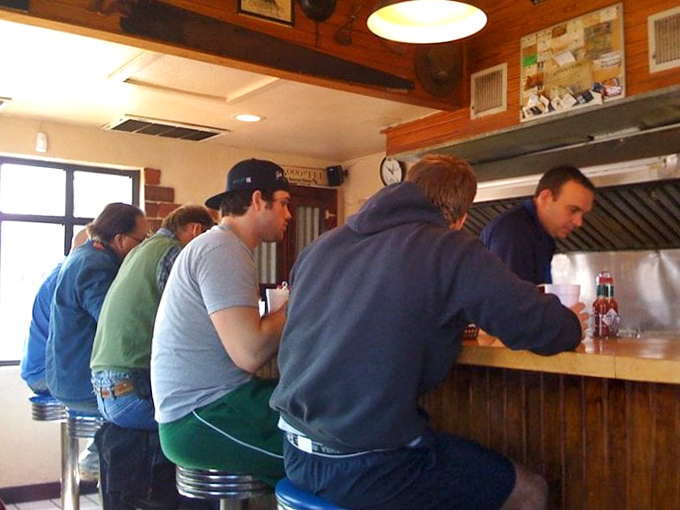 The counter seating isn't just practical&mdash;it's theater-in-the-round where fellow diners become temporary friends united by anticipation.