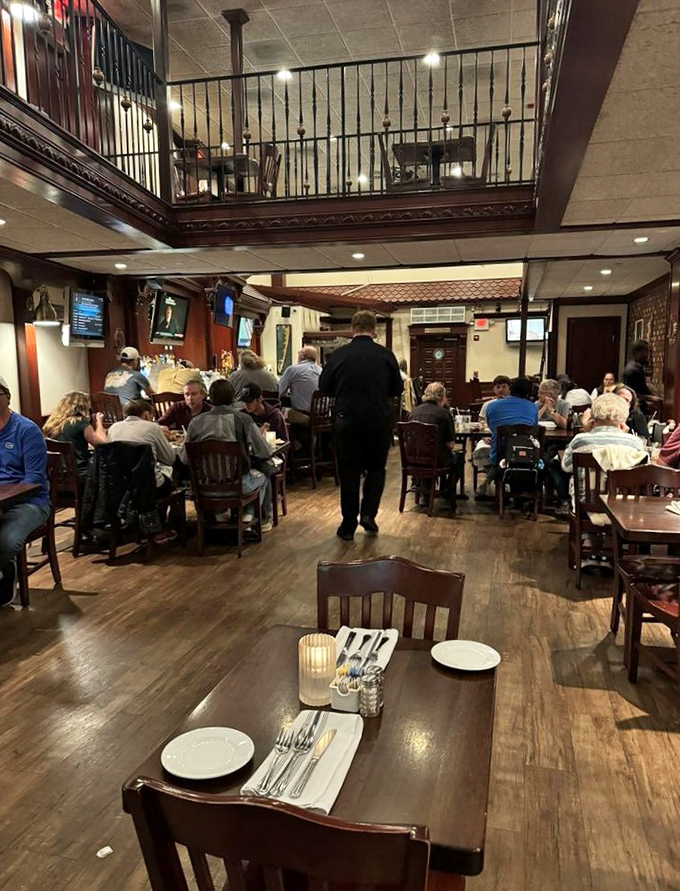 Where strangers become neighbors over shared appreciation of good food. That server's pace suggests delicious things are imminent.