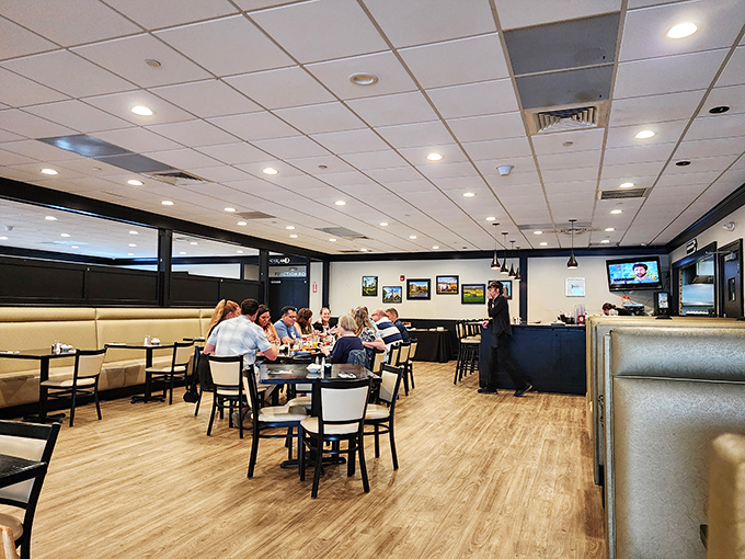 A bustling dining room where conversations and coffee flow freely, and nobody's in a rush to document their meal for social media validation.