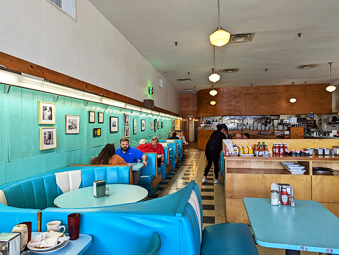 Where locals and visitors sit elbow-to-elbow, united by the universal language of "pass the syrup, please." 