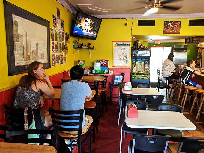 Locals know the best conversations happen over hot dogs. The modest dining area becomes a community gathering spot.