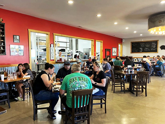 The dining room hums with the universal language of "mmm"&mdash;strangers united by the brotherhood of excellent barbecue and shared tables.