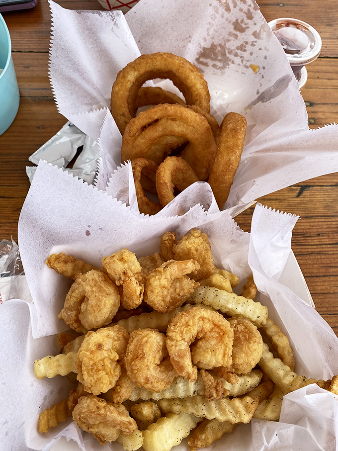 Seafood's perfect dance partners: crispy shrimp and those onion rings that make you wonder why you'd ever eat vegetables any other way.