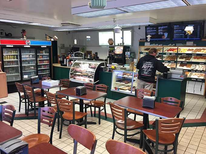 The full view reveals Donut Hut's practical charm—where function follows form and every element serves the higher purpose of getting donuts into hungry hands.