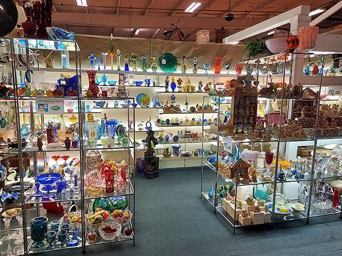 A kaleidoscope of colored glass transforms ordinary shelves into a dazzling rainbow gallery&mdash;each piece catching light like a crystallized memory.