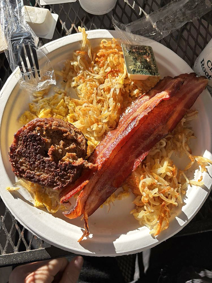 This breakfast platter doesn't just break the fast&mdash;it shatters it with crispy hash browns, bacon that means business, and eggs that didn't come from a carton.