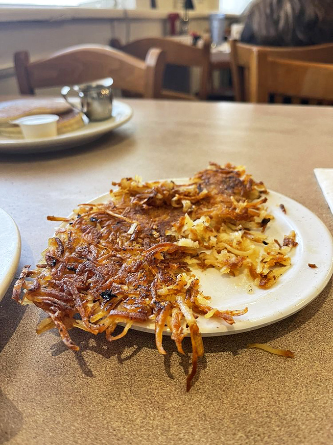 Hash browns with the perfect crisp-to-tender ratio &ndash; the unsung heroes of breakfast that deserve their own spotlight and standing ovation.