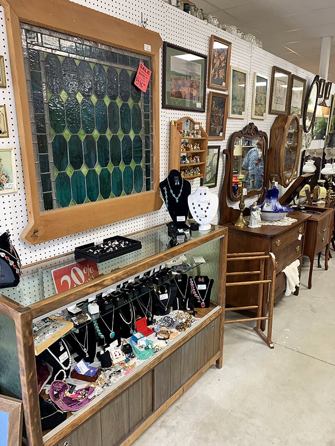 Vintage fur coats and vibrant party dresses wait for their second act, like retired performers ready for one more night on the town.