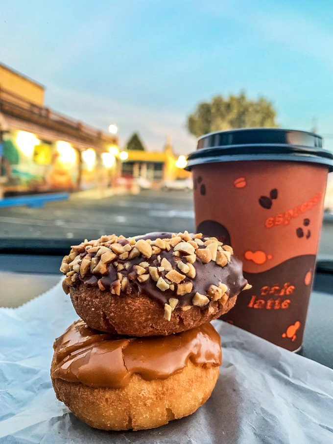 Morning bliss in car form&mdash;these donuts and coffee turning an ordinary dashboard into the best breakfast table in town.