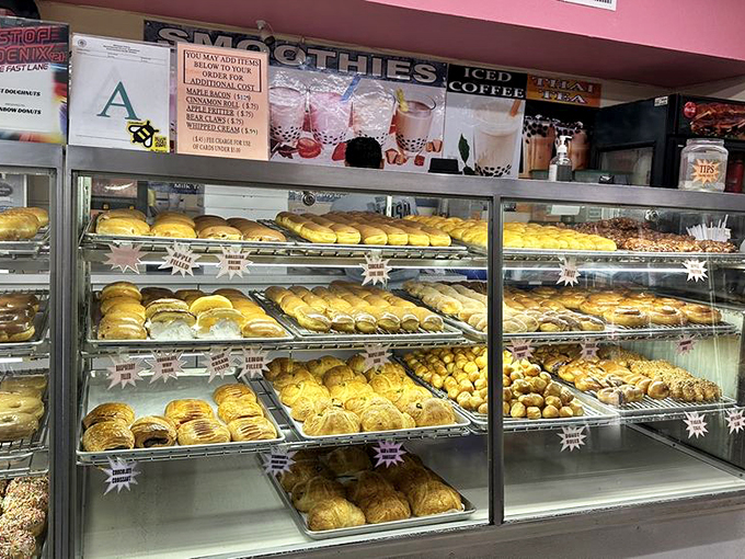 A donut case that makes choosing just one an exercise in existential crisis. "I'll take one of each" is a perfectly reasonable response.