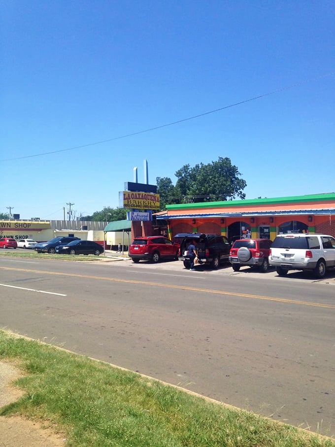 On a sunny Oklahoma day, this colorful storefront stands out like a tropical bird among pigeons. The full parking lot is the universal symbol for "worth stopping."