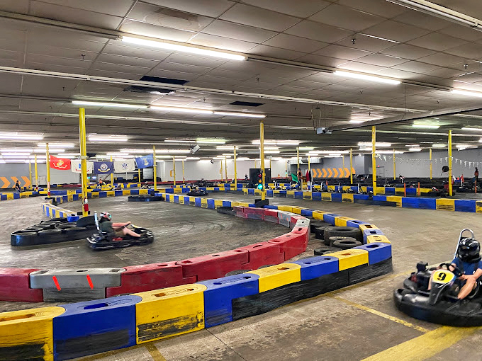 Poetry in motion as karts navigate the course's challenging curves. The real race is against your previous best time.