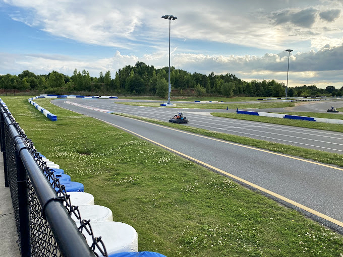 Long straightaways invite courage while tight corners demand respect—a perfect metaphor for life, just with more horsepower.