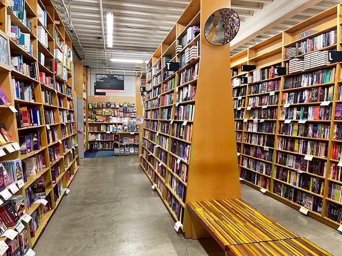 Walking these aisles feels like strolling through neighborhoods of narrative, each shelf a street address where characters and ideas permanently reside.