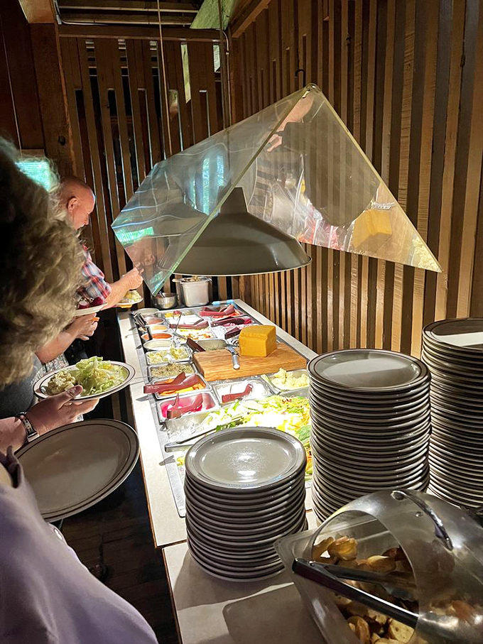 The salad bar stands ready &ndash; part obligatory vegetable opportunity, part strategic stomach space management before the main event arrives.