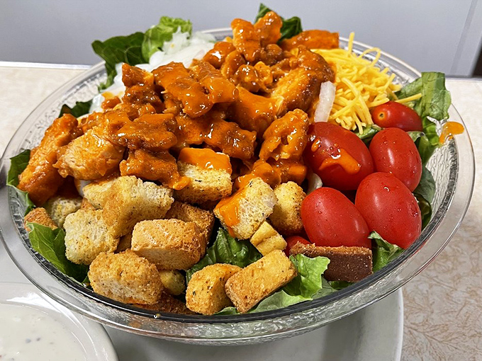 Buffalo chicken salad that bridges the gap between "I should eat something healthy" and "but I really want something delicious."