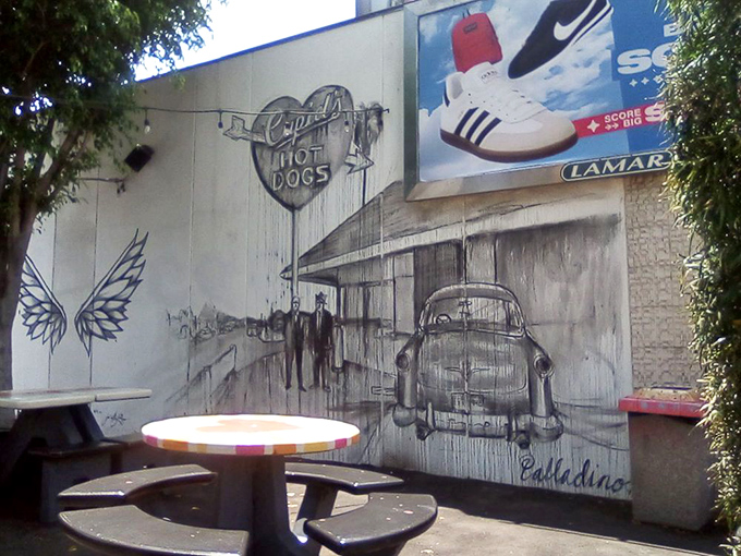 The colorful mural captures Cupid's nostalgic spirit &ndash; a time machine painted on a wall, with hot dogs as the fuel.