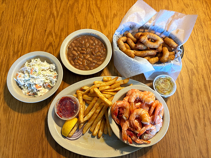 Shrimp, slaw, beans, and hushpuppies&mdash;a quartet that performs in perfect harmony. This plate is singing a delicious Southern melody.