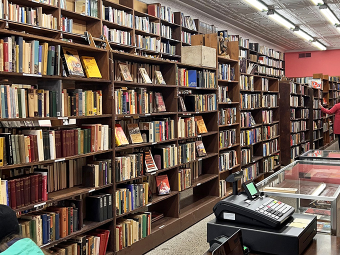 Floor-to-ceiling possibilities in every direction. The wooden shelves have probably heard more gasps of discovery than a detective at a crime scene.