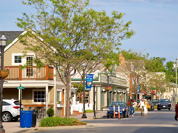Pastel-colored storefronts and tree-lined streets create the quintessential coastal shopping experience, where finding parking might be harder than finding treasures.