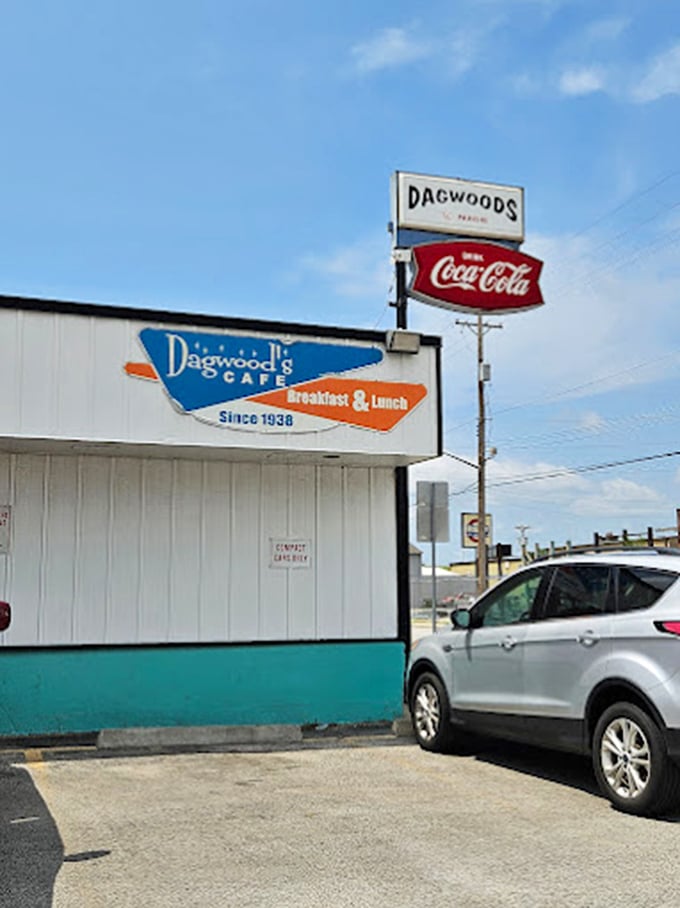 That vintage Dagwood's sign has guided hungry travelers for generations, like a blue and orange lighthouse for breakfast seekers.