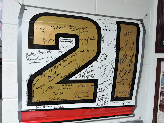 Racing royalty left their mark on this golden #21&mdash;a constellation of signatures from the stars who made NASCAR America's high-speed obsession.