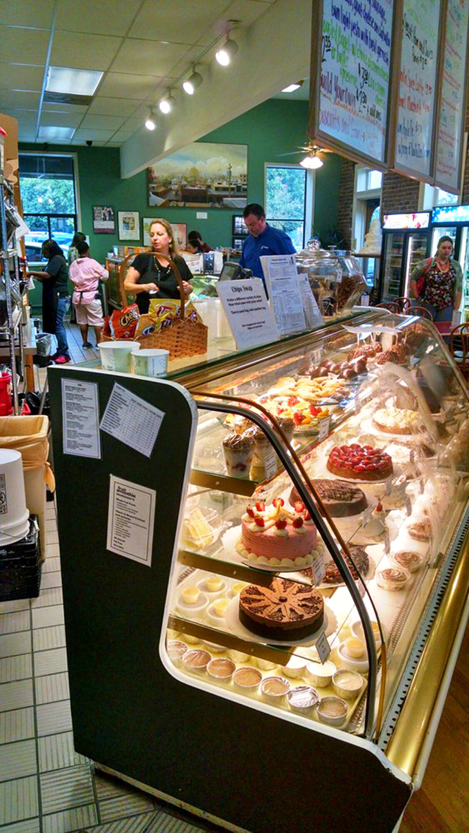 The front lines of flavor, where dedicated staff orchestrate the delicate ballet of getting baked goods from case to customer without incident.
