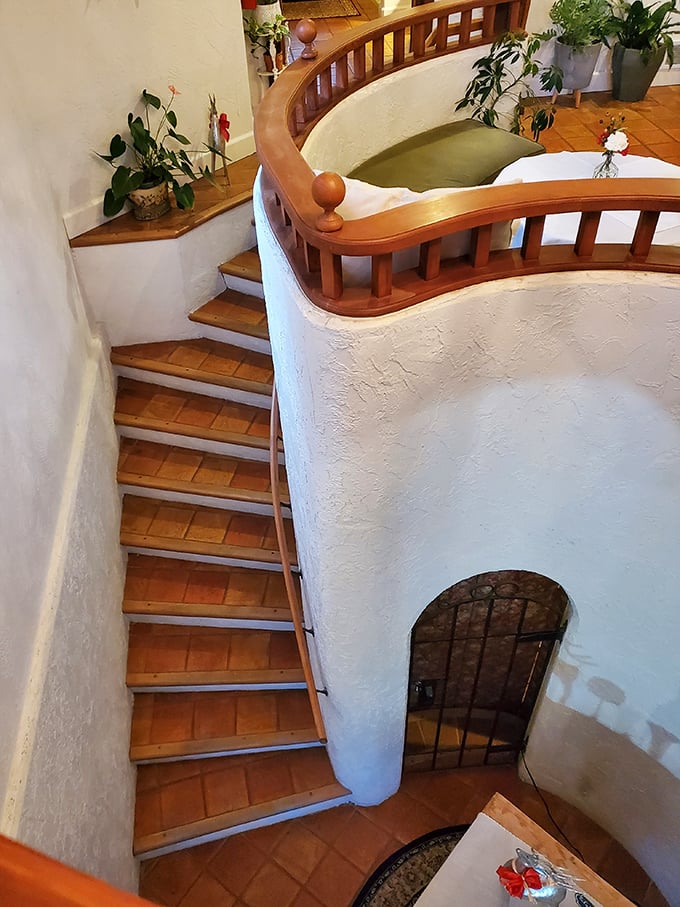 This elegant chandelier casts a warm glow that transforms ordinary evenings into something from the pages of a storybook.