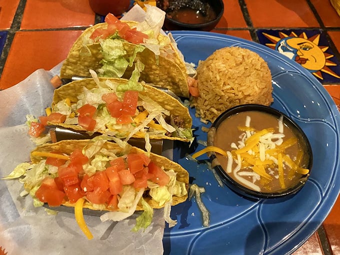 These tacos aren't just served—they're presented, with each colorful ingredient playing its part in the delicious symphony.