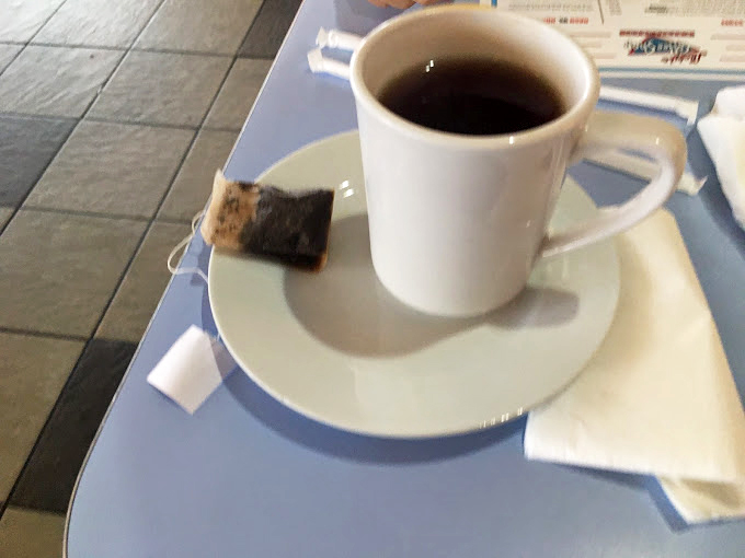 A simple cup of coffee at Lucky's is like a warm handshake. No foam art needed when the conversation is this good.