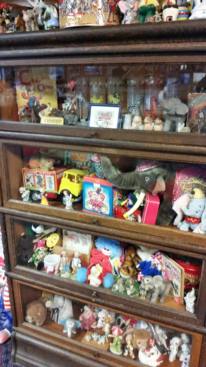 This cabinet of curiosities showcases decades of circus collectibles. Dumbo would feel right at home among these whimsical treasures.