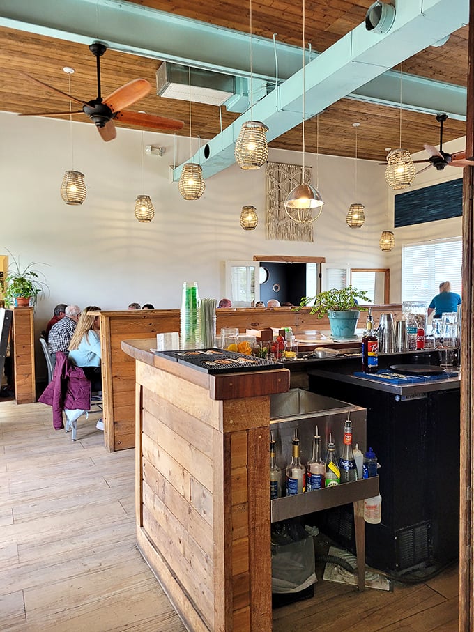High ceilings, basket lights, and wooden accents create that "I could stay here all day" vibe that neighborhood gems are known for.