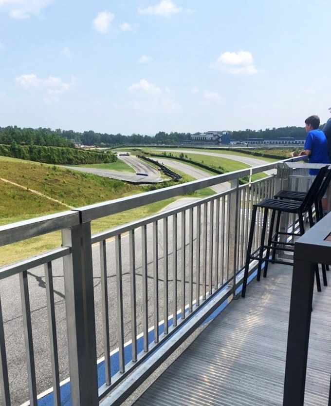 Track-side dining with a view that beats any restaurant window seat. The soundtrack? The sweet symphony of engines at full throttle.