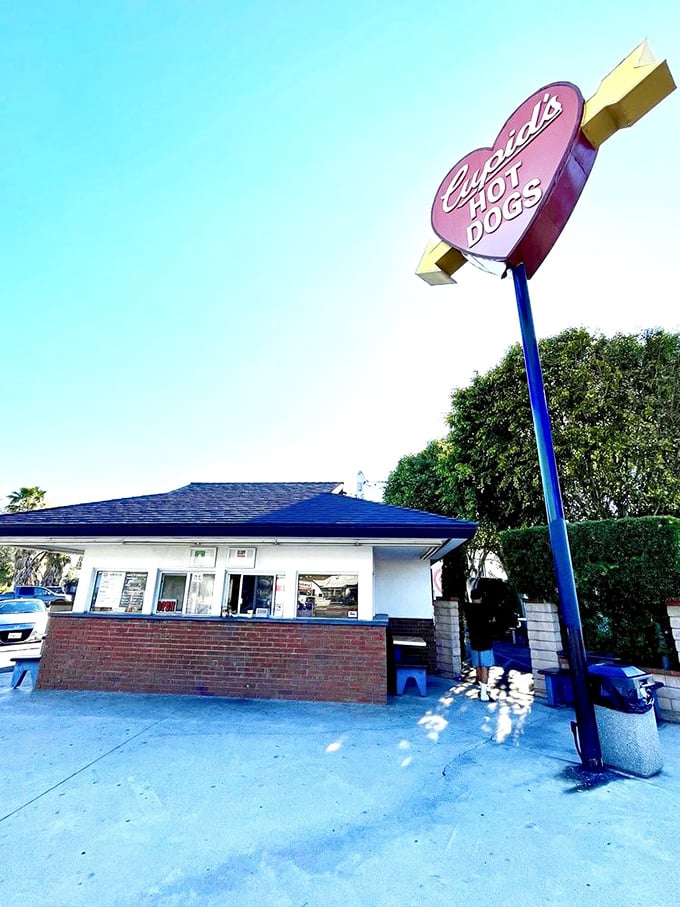 Cupid's heart-shaped sign has been stealing hot dog lovers' hearts in the Valley long before Instagram made such landmarks famous.