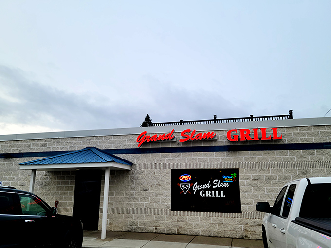 Grand Slam Grill's modest stone exterior is the Clark Kent disguise for Superman-level steaks. Never judge a book by its concrete cover.