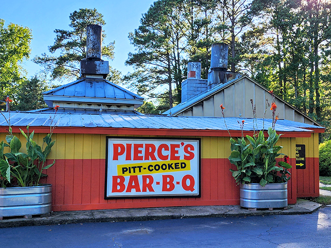 Pierce's bold yellow and red building stands out like a barbecue beacon. Those smokestacks aren't architectural whimsy &ndash; they're working overtime on your behalf.
