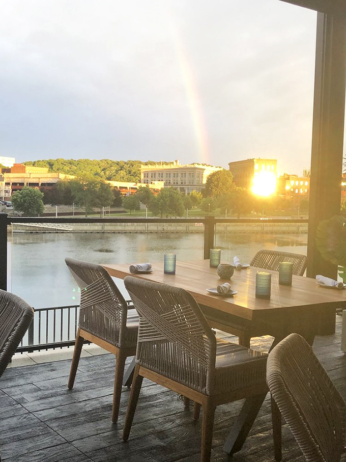 That rainbow over the water isn't photoshopped—it's the universe's way of blessing your decision to order the seafood tower.