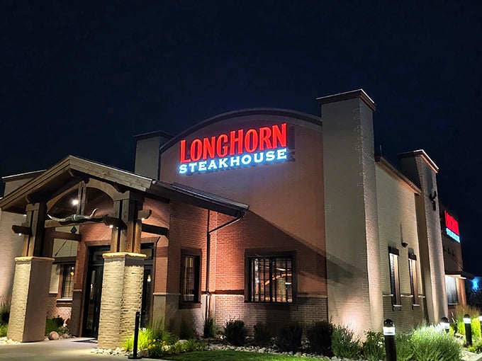 Night transforms LongHorn into a glowing steak sanctuary. Chain restaurants can surprise you when they focus on what matters.