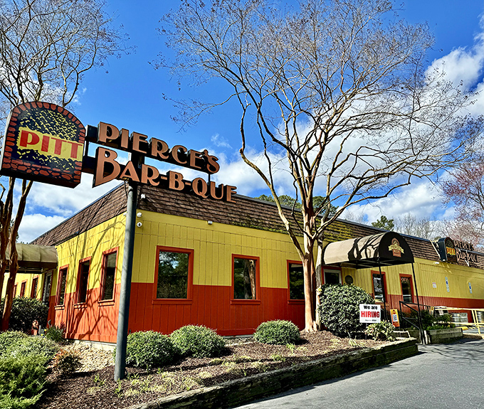 Pierce's colorful sign has guided hungry travelers for decades. Like a barbecue lighthouse, it signals safe harbor for those lost in a sea of mediocre meals.