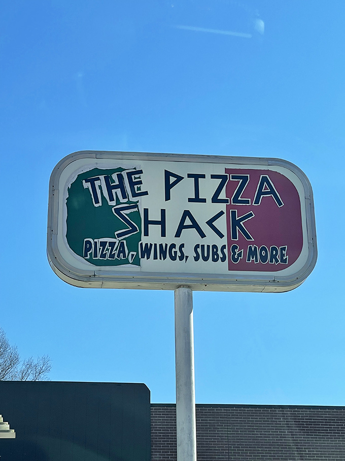 That sign tells you everything you need to know&mdash;straightforward name, extraordinary pizza. Sometimes the best things come in unassuming packages.