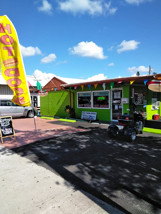 This cheerful hot dog haven with its festive flags looks like it was designed by someone who truly understands joy.