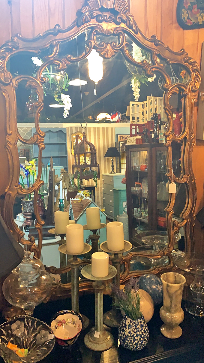 A mirror fit for Versailles reflects the faces of shoppers past and present. Its ornate frame has outlasted several presidential administrations.