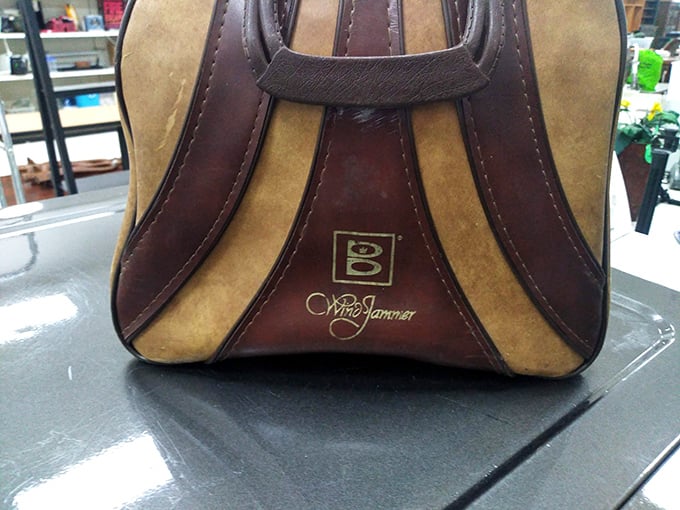 A vintage bowling bag with character to spare. Strike gold with retro accessories that bring personality to any outfit.