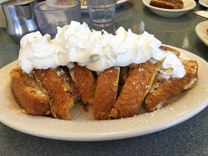 A waffle that understood the fall assignment. That whipped cream swirl isn't just decoration&mdash;it's structural engineering at its finest.