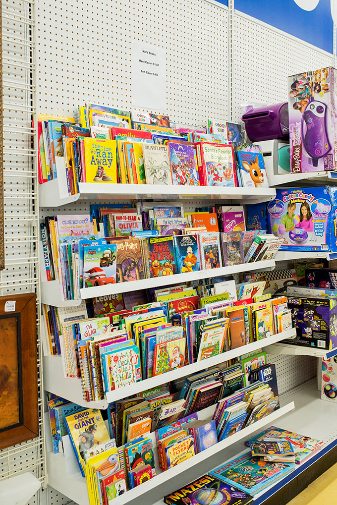 The children's book section holds dog-eared adventures waiting to enchant a new generation of little readers with timeless stories.