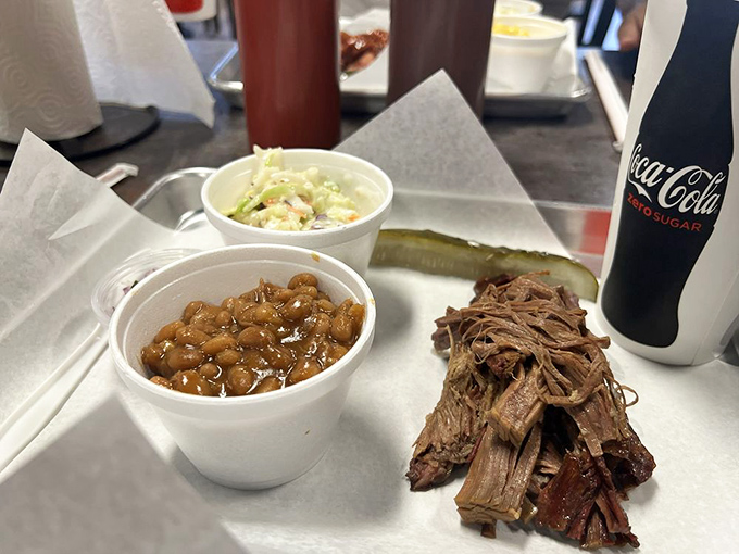 The barbecue trinity: smoked meat, beans, and slaw. Add a pickle for brightness, and suddenly Monday doesn't seem so bad after all.
