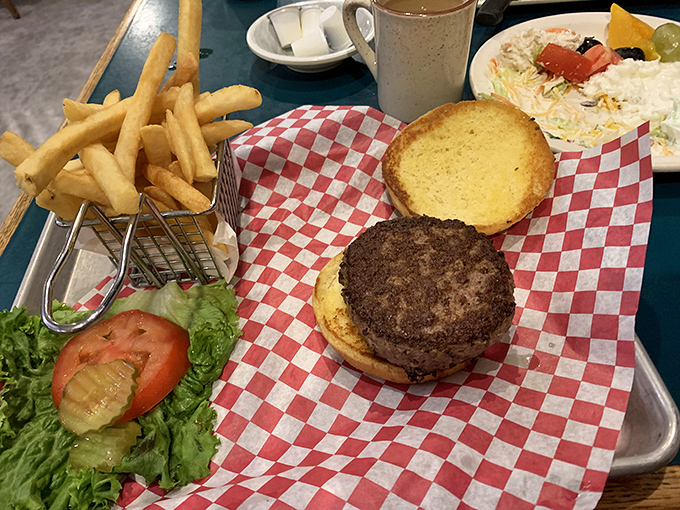 Burgers should require both hands and several napkins. Tonka Hills understands this fundamental truth about proper American dining.