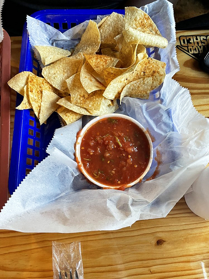 Crispy triangles surrounding a salsa pool of possibility. The perfect chips-to-salsa ratio is no accident&mdash;it's breakfast engineering at its finest.